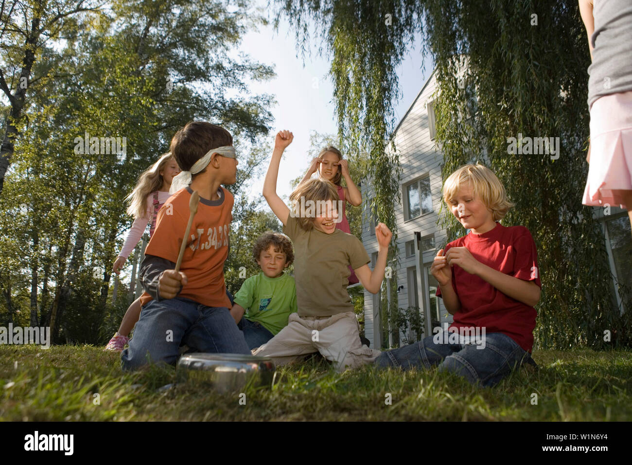 Children playing Hit the Pot, children's birthday party Stock Photo - Alamy