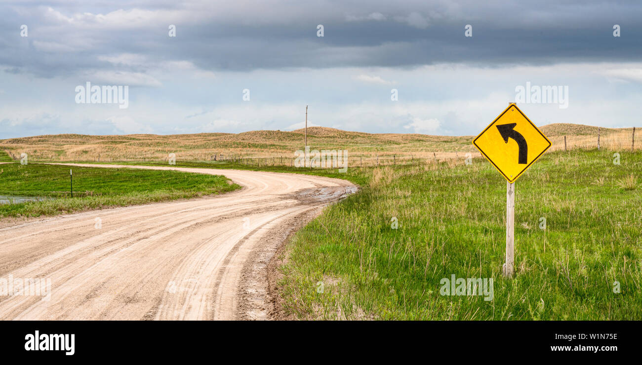 Windy road sign hi-res stock photography and images - Alamy