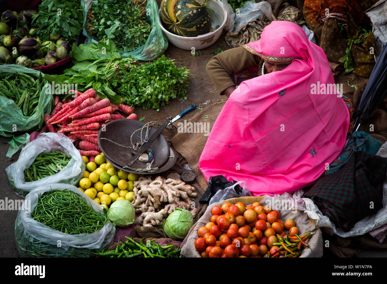 Vegetable vendor sitting on a street, Pushkar, Rajasthan, India Stock ...
