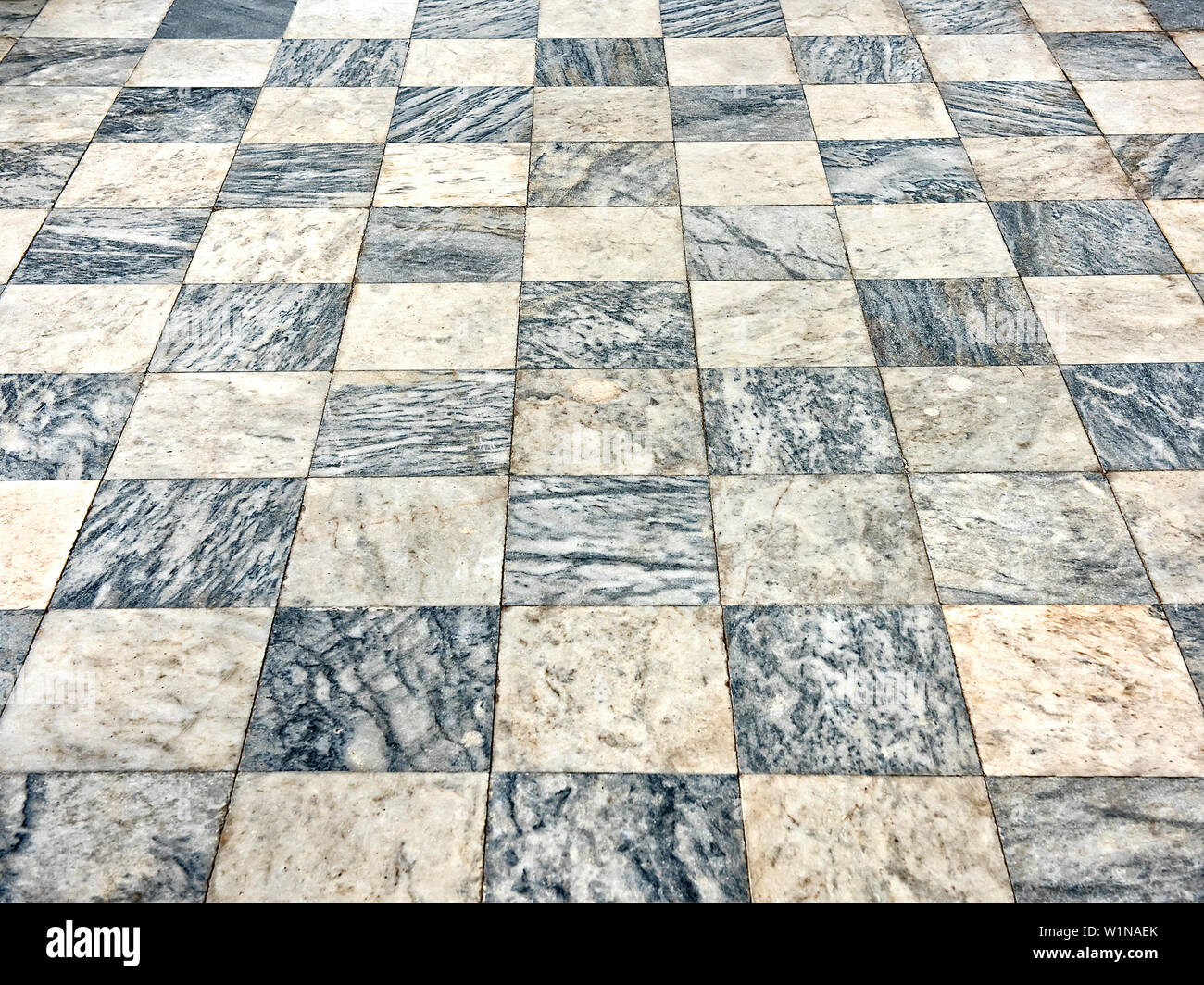 old floor of light and dark marble squares Stock Photo - Alamy