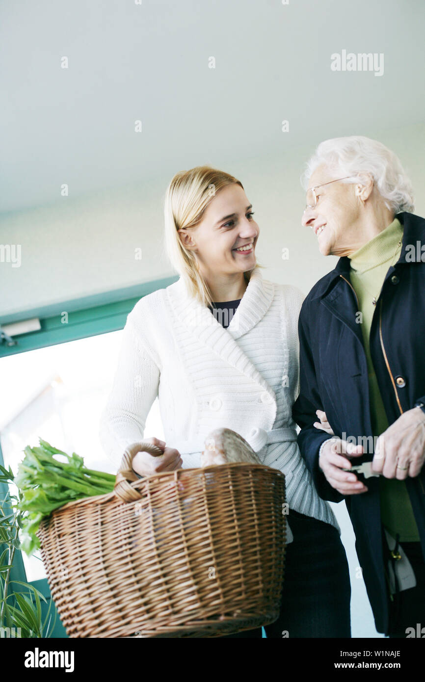 Helping someone carry hi-res stock photography and images - Alamy