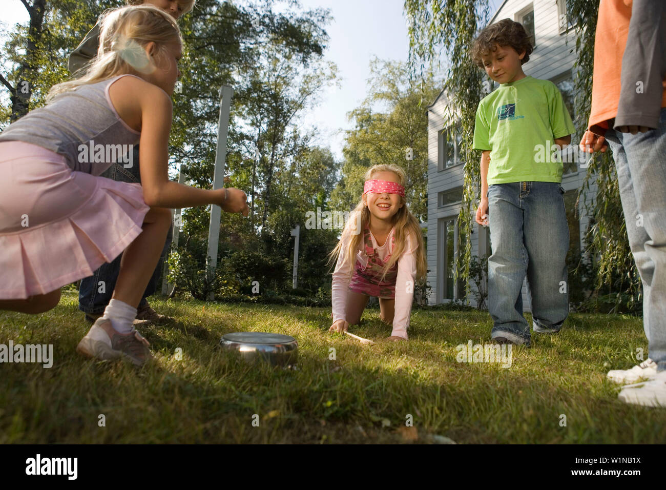 Children playing Hit the Pot, children's birthday party Stock Photo - Alamy