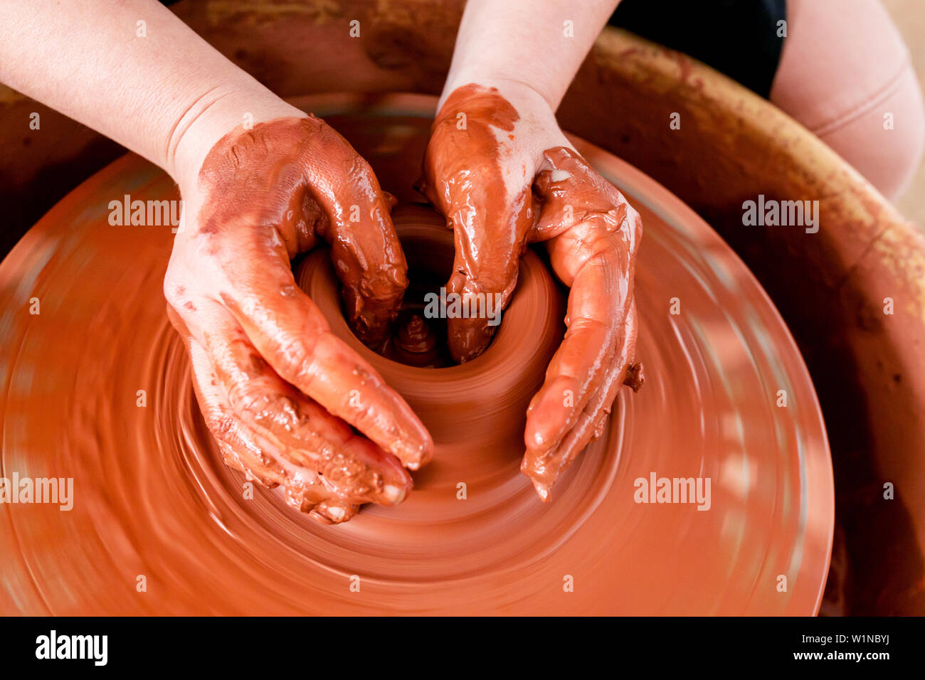 Professional potter making bowl in pottery workshop, studio Stock Photo ...