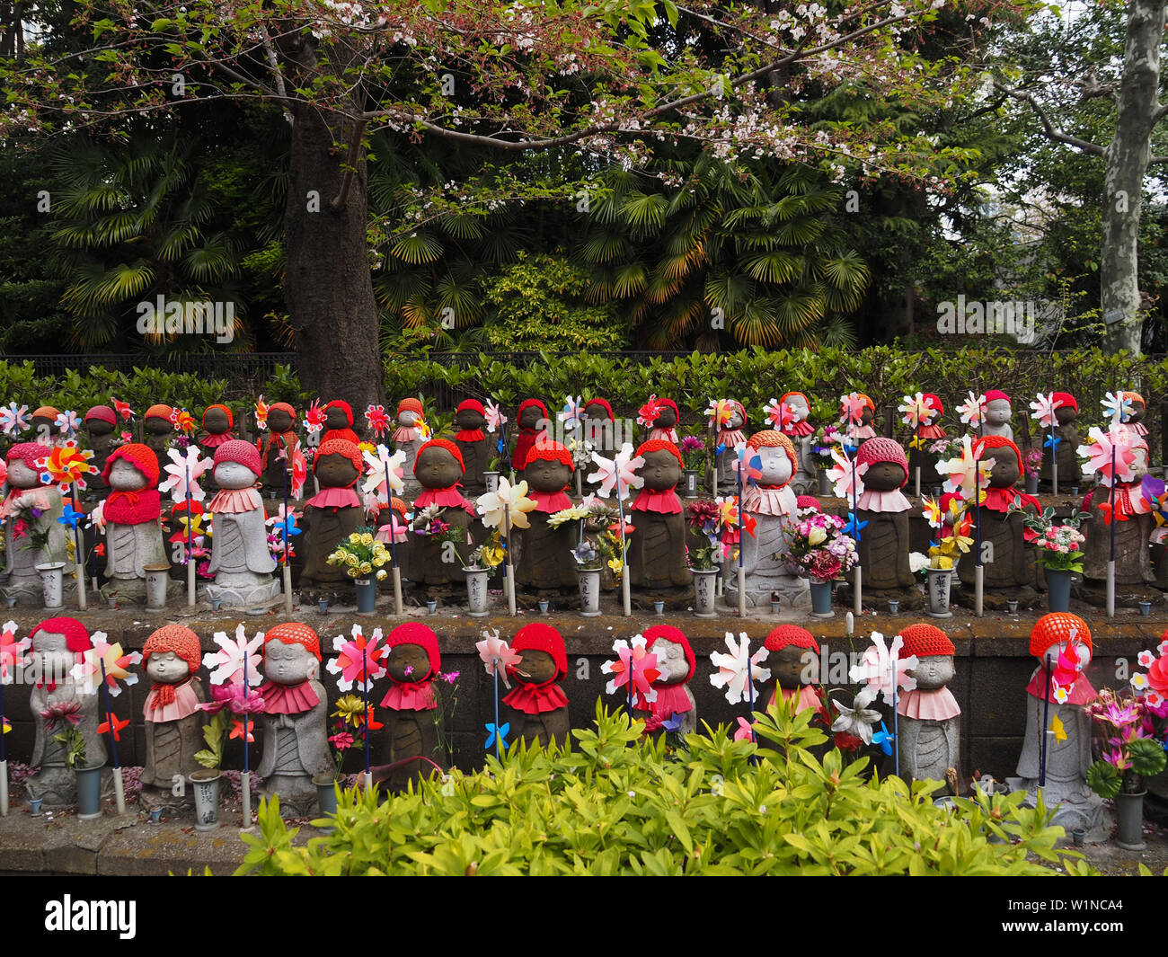 jizo statues at zojoji temple in Tokyo Japan Stock Photo - Alamy