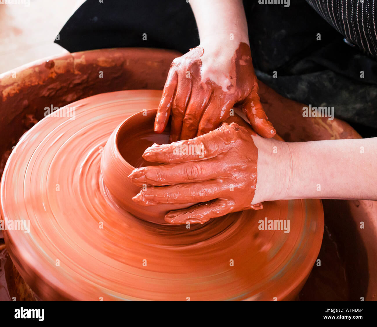 Professional potter making bowl in pottery workshop, studio Stock Photo ...
