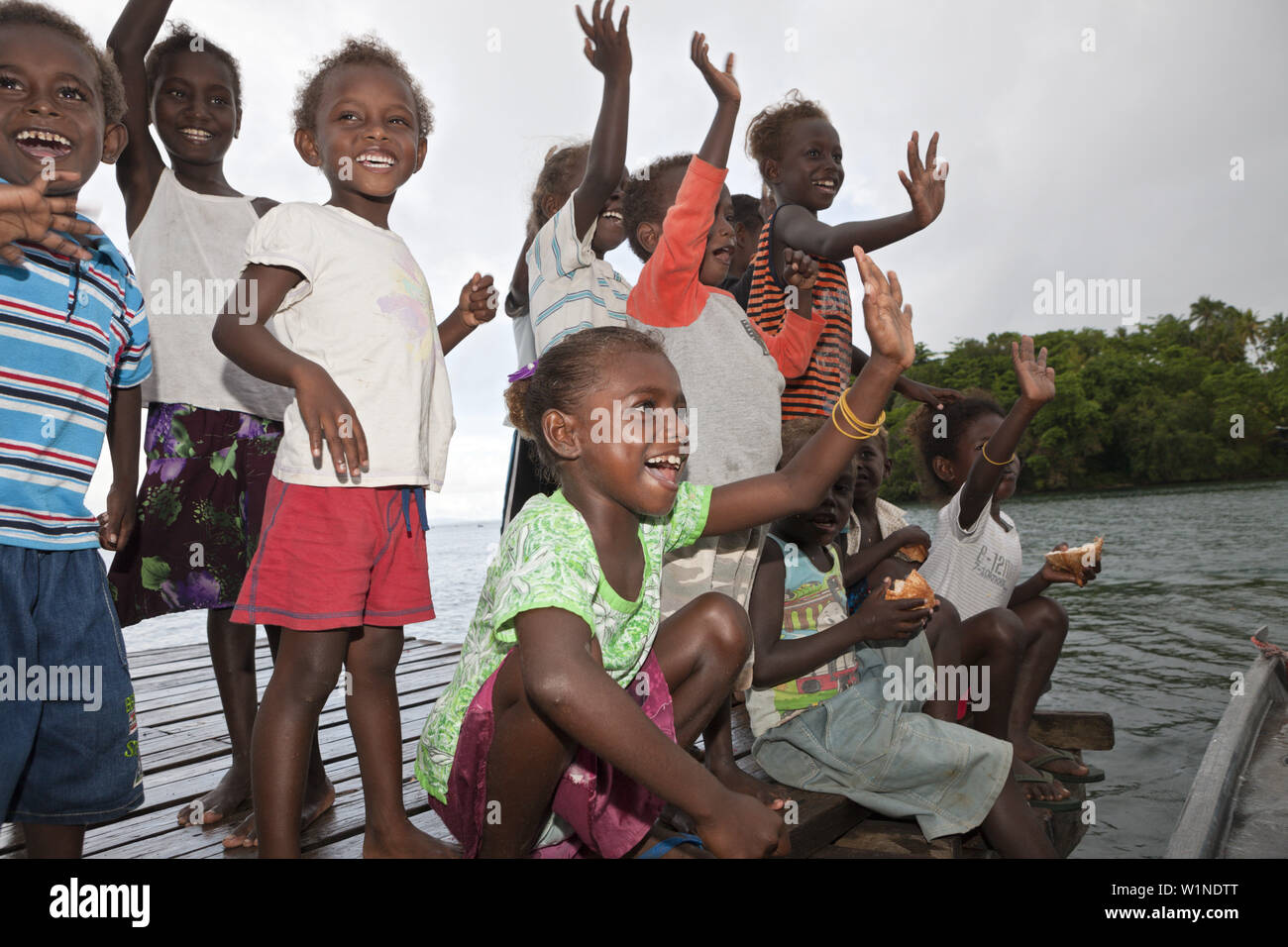 People of Telina Island welcome Visitors, Marovo Lagoon, Solomon ...