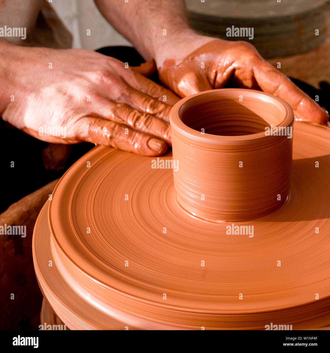Professional potter making bowl in pottery workshop, studio Stock Photo ...