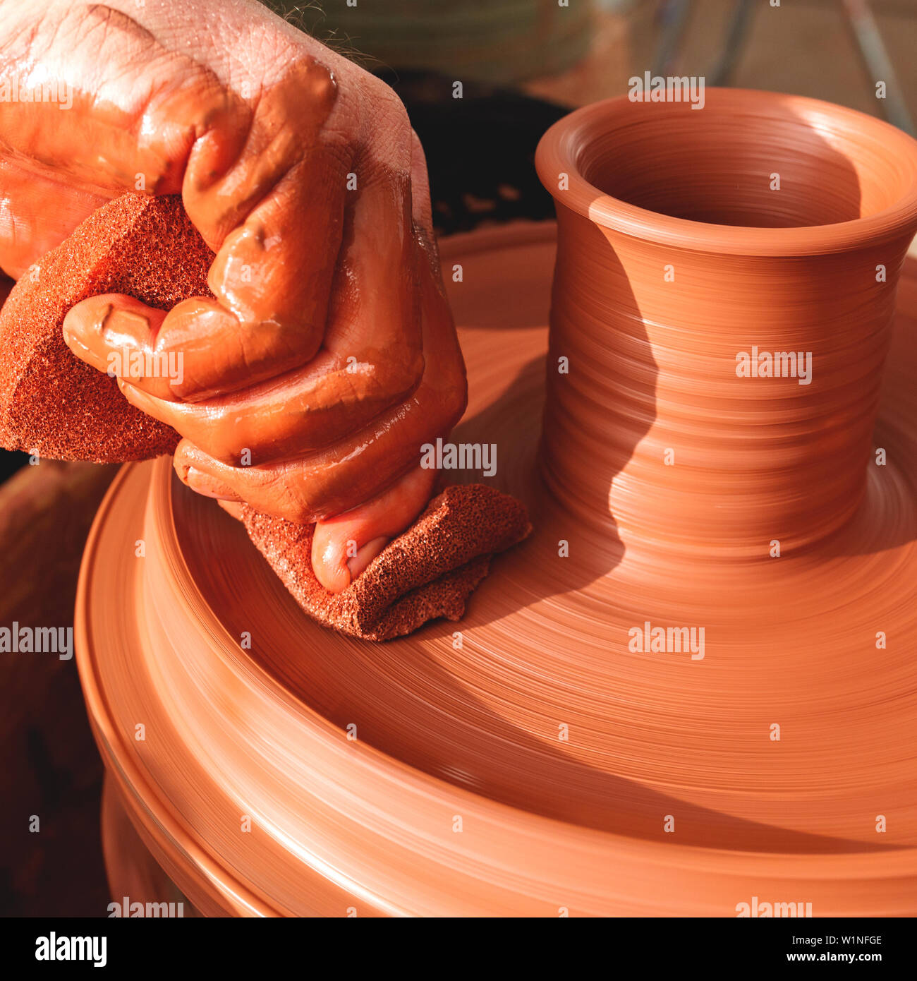Professional potter making bowl in pottery workshop, studio Stock Photo ...