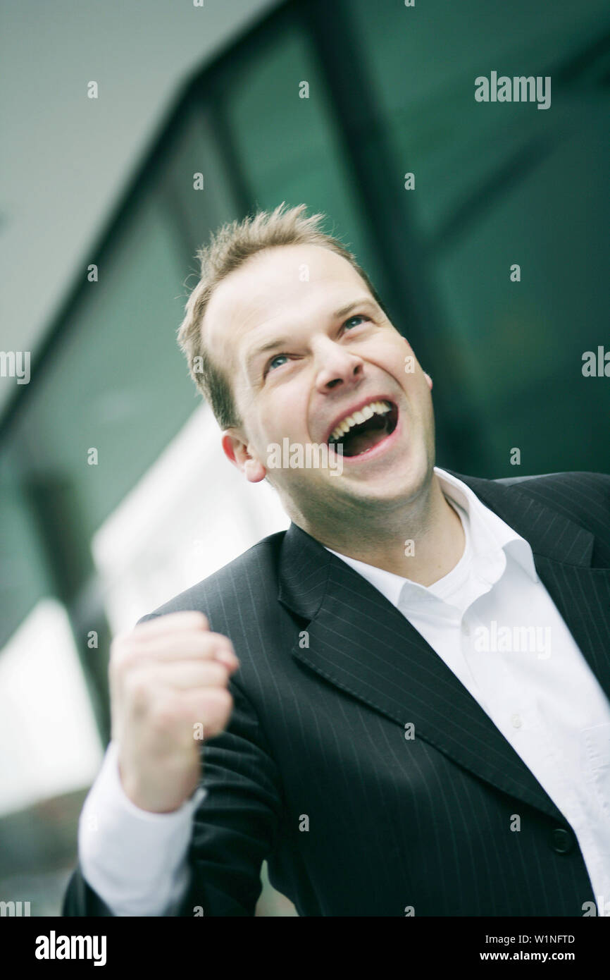 Business man is pleased about a deal Stock Photo - Alamy