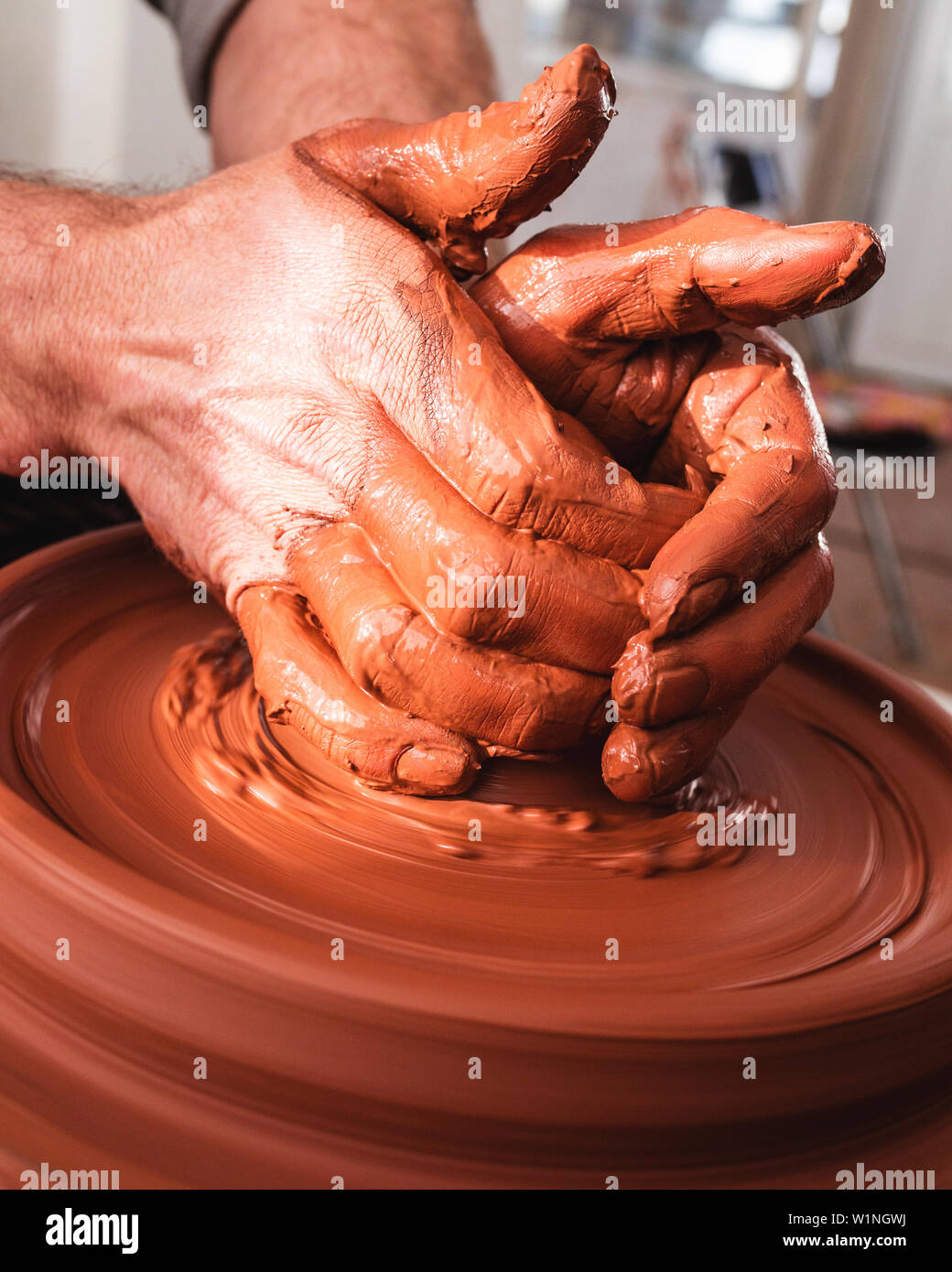 Professional potter making bowl in pottery workshop, studio Stock Photo ...