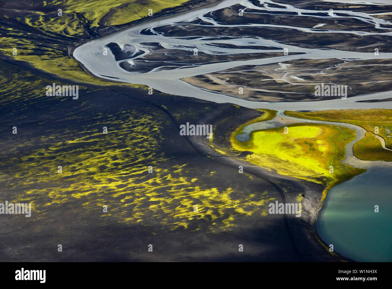 Aerial view of meander of glacial river tungnaa floating over a sander ...
