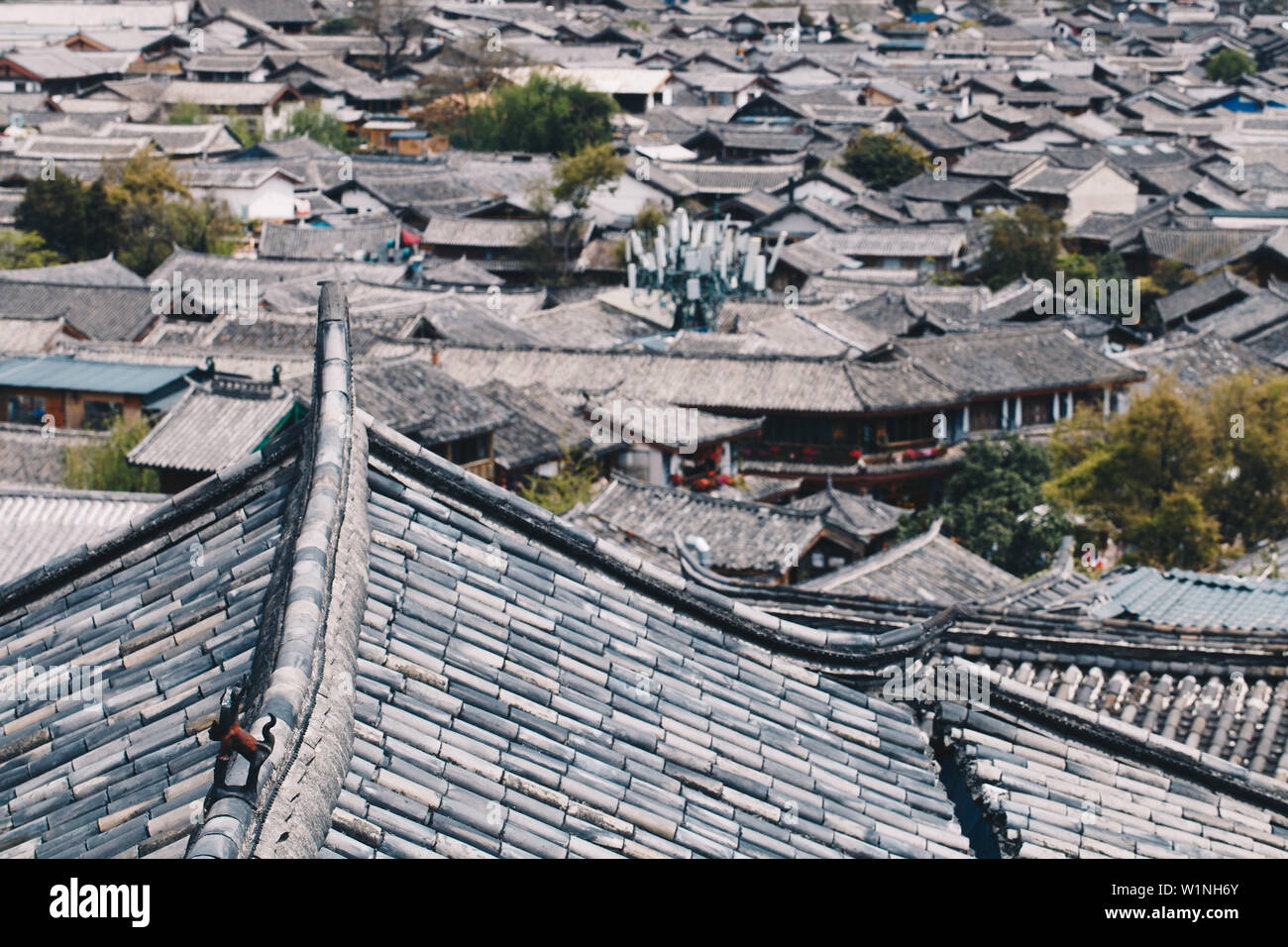 Traditional ancient Chinese style buildings roofs in Old Lijiang Town ...