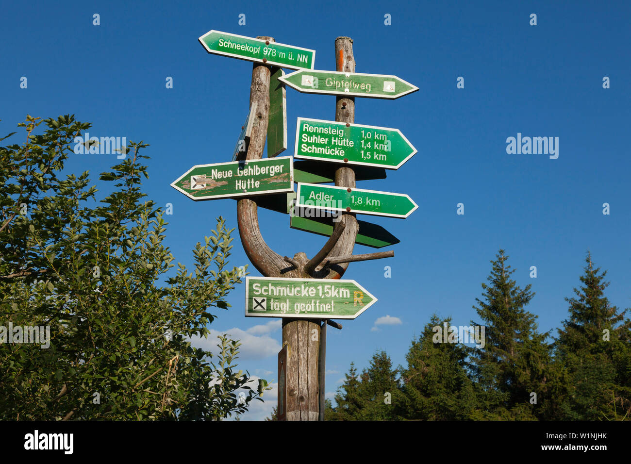 Signpost at a hiking trail at Schneekopf hill, nature park Thueringer ...
