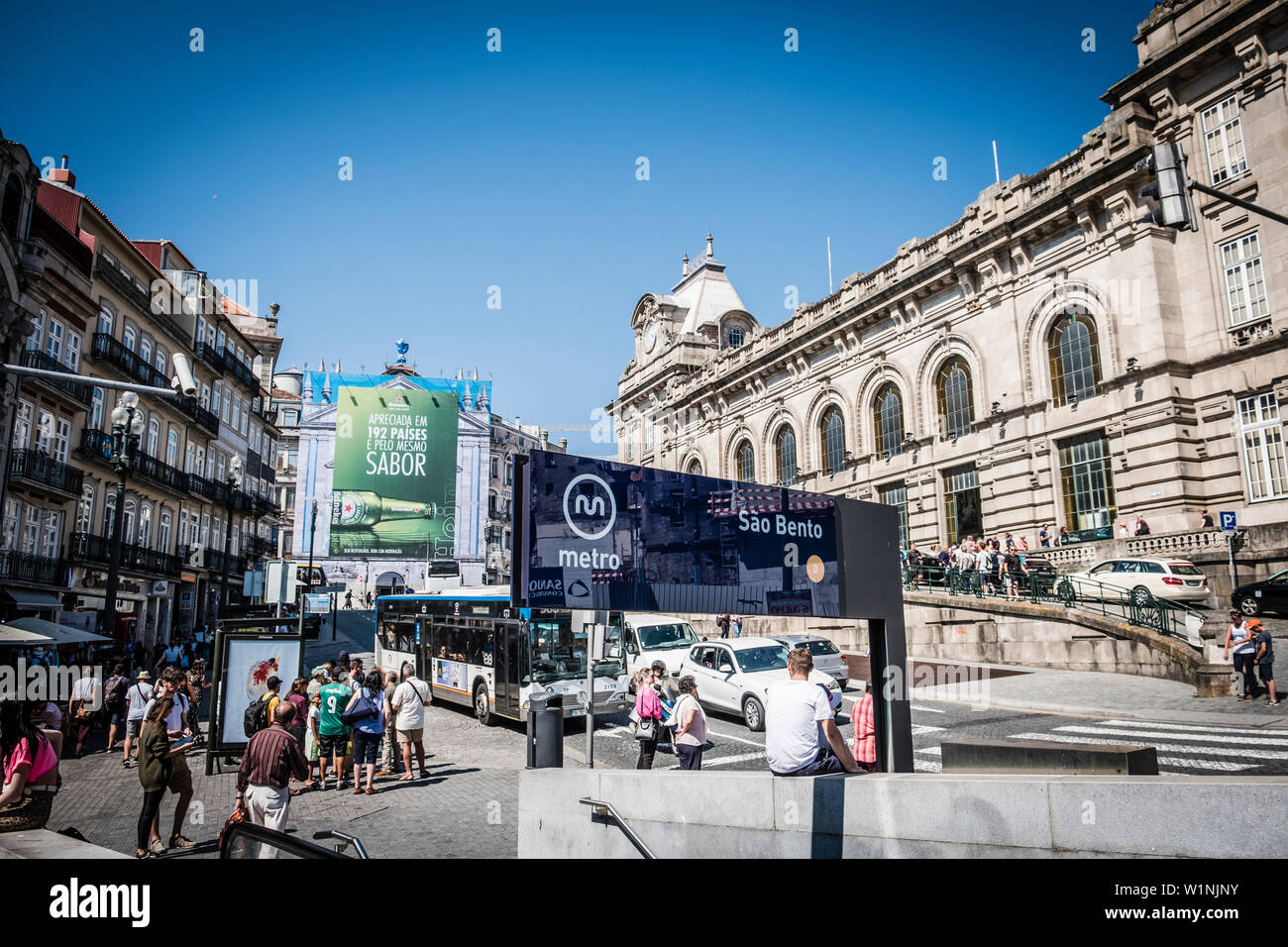 People walking in the beautiful and typical streets of Porto on a ...