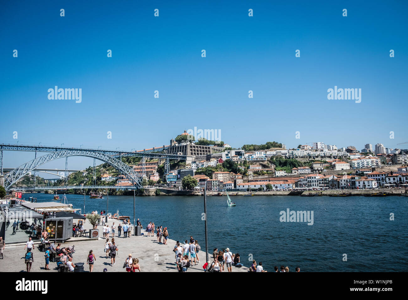People walking in the beautiful and typical streets of Porto on a ...