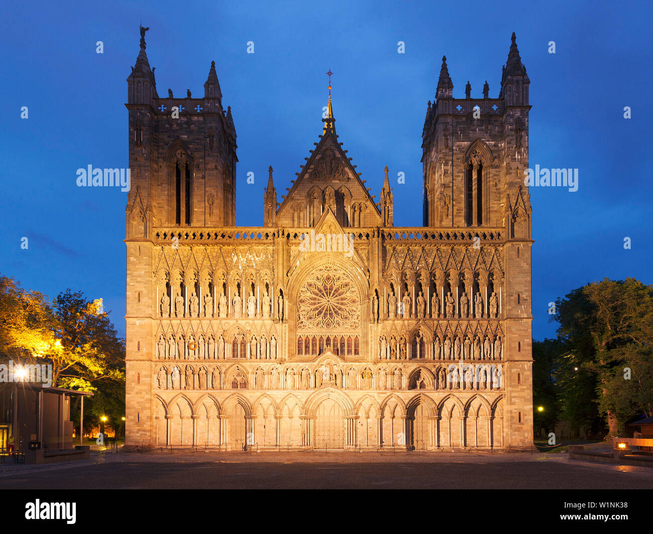 Facade of the Neo-Gothic Cathedral Nidaros Cathedral at dusk, Trondheim ...