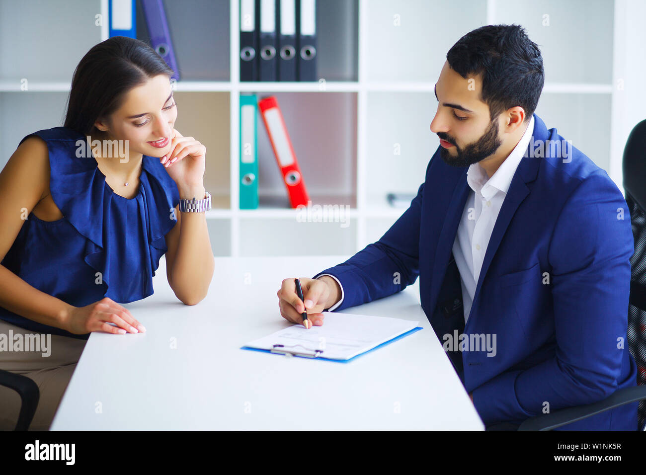 A people in the office signing contract Stock Photo - Alamy