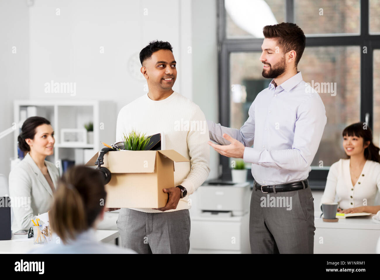 Business man introducing new employee hi-res stock photography and ...