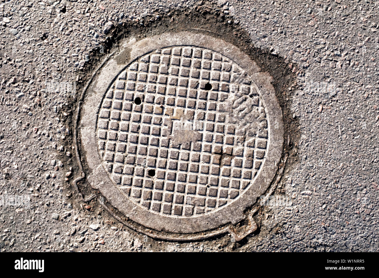 manhole on the street Stock Photo - Alamy