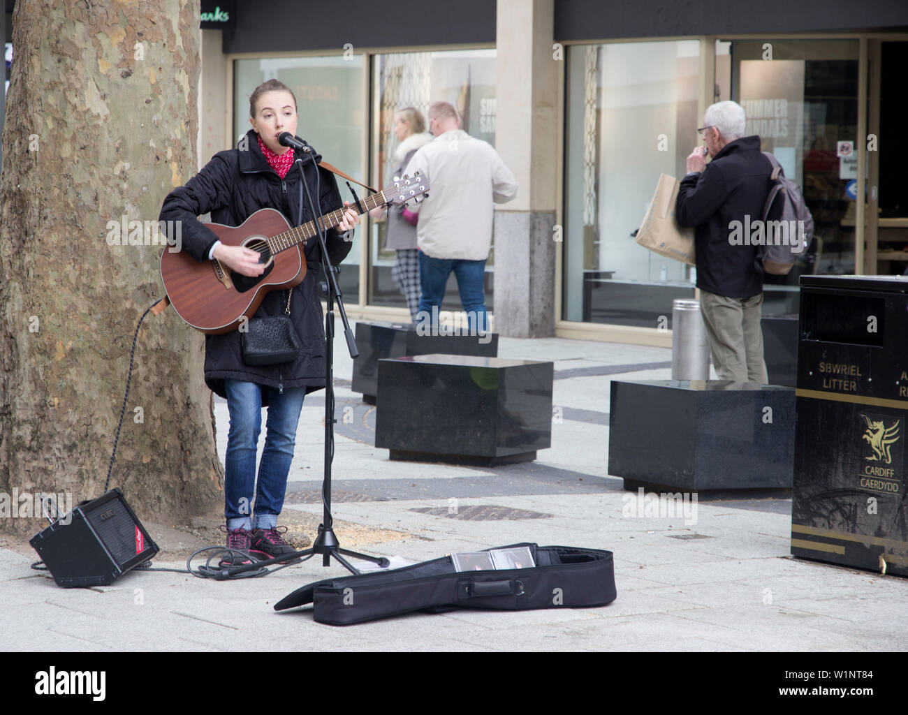 Young woman busker street musician hi-res stock photography and images ...