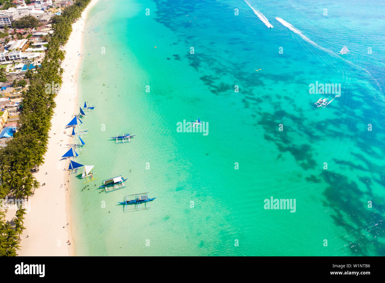 Blue sailing boats off the island of Boracay. Seascape, beautiful ...