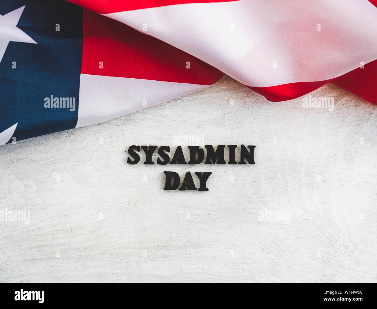 Beautiful greeting card for Sysadmin Day. Wooden letters with a ...