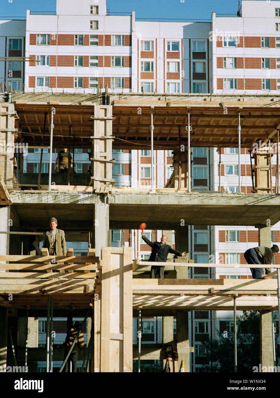 Construction workers, Moscow Russia Stock Photo - Alamy