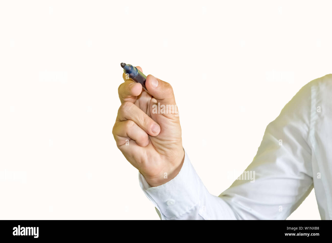 adult hand write something with marker on transparent glass, isolated ...