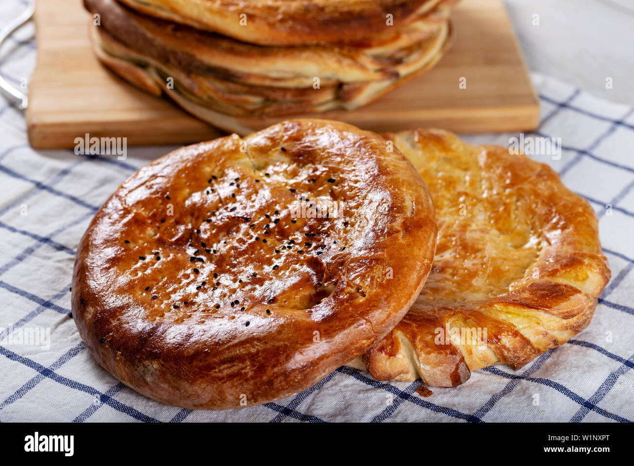 Homemade circle bread and Turkish flaky pastry (katmer Stock Photo - Alamy