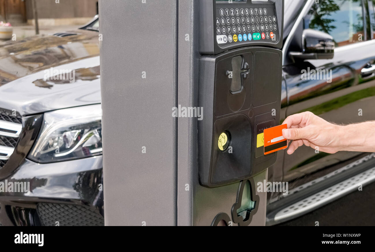 Paying parking charge hi-res stock photography and images - Alamy