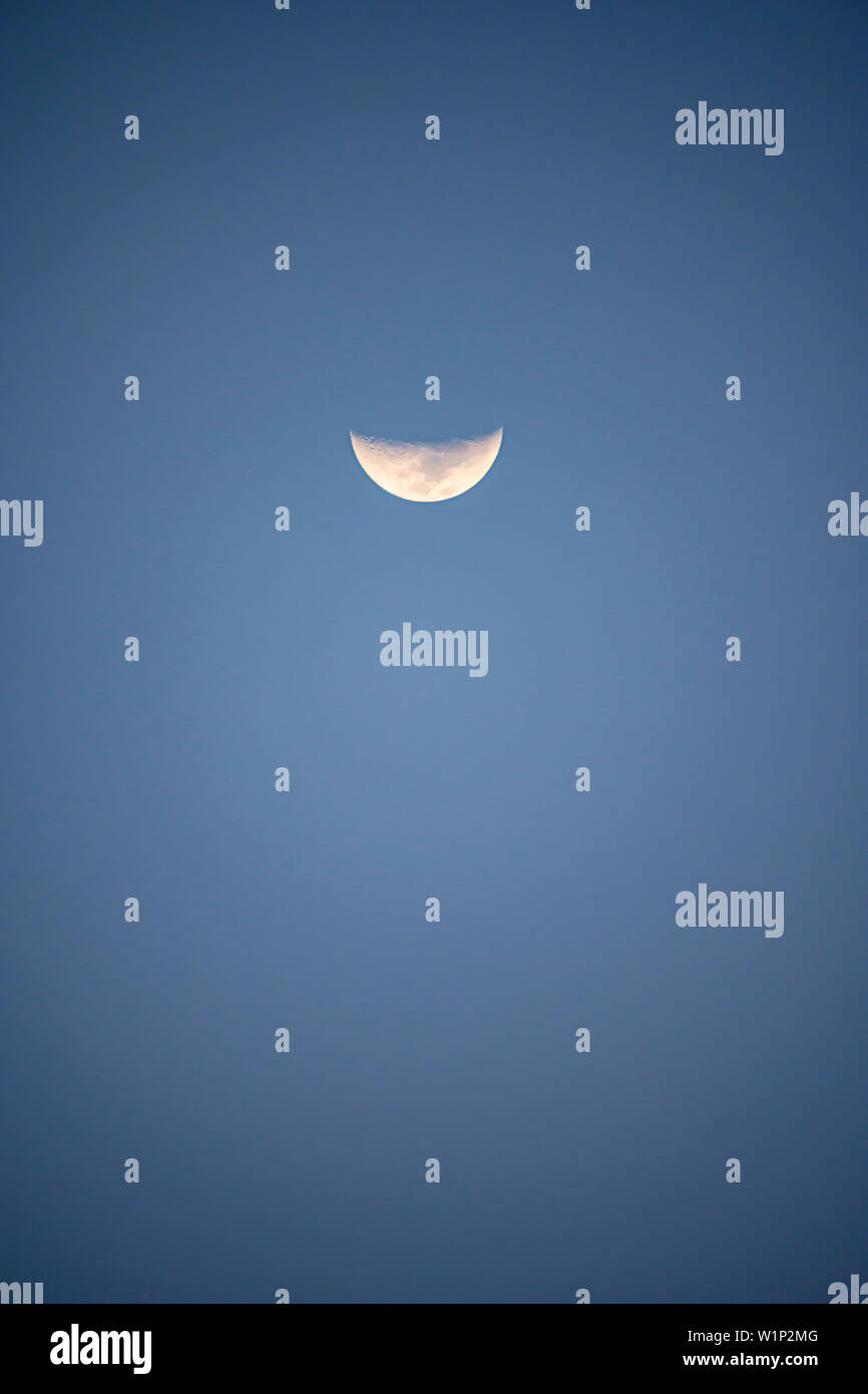 Moon in daylight On the bright sky Stock Photo - Alamy