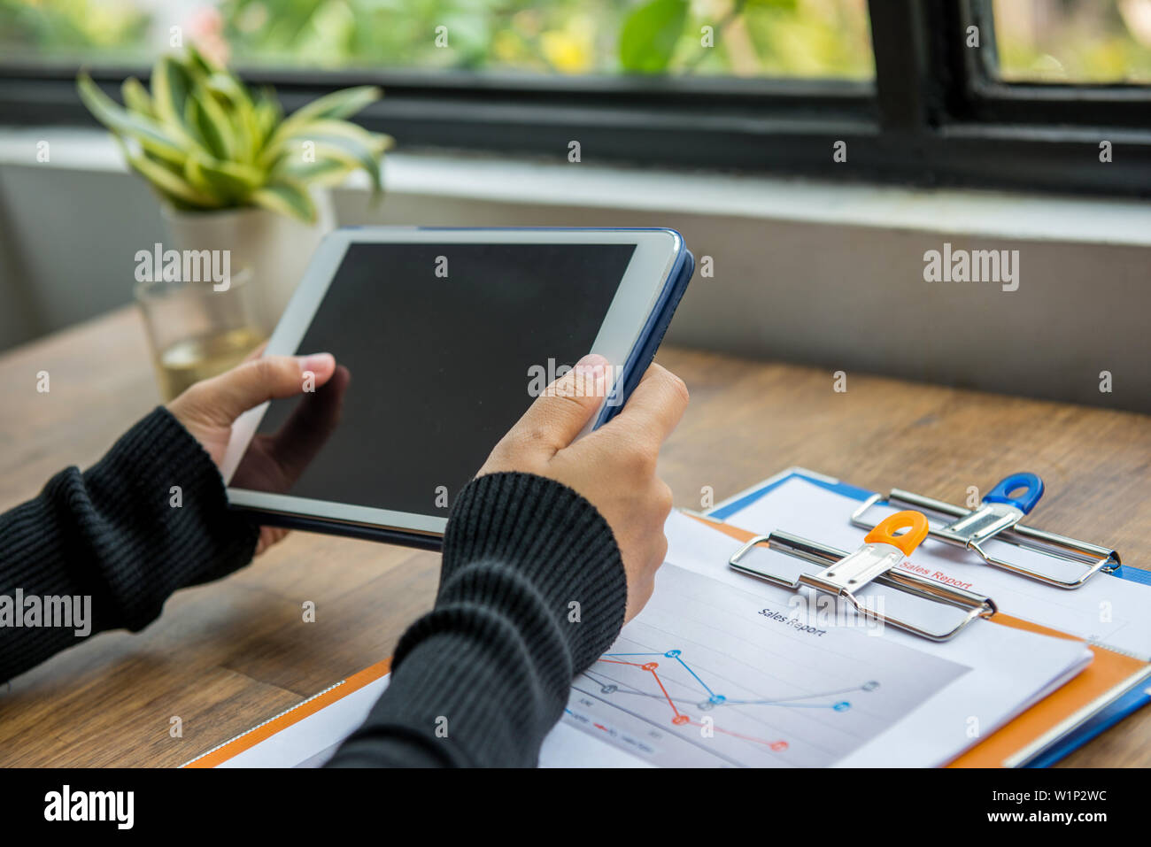Woman tapping tablet screen showing hi-res stock photography and images ...
