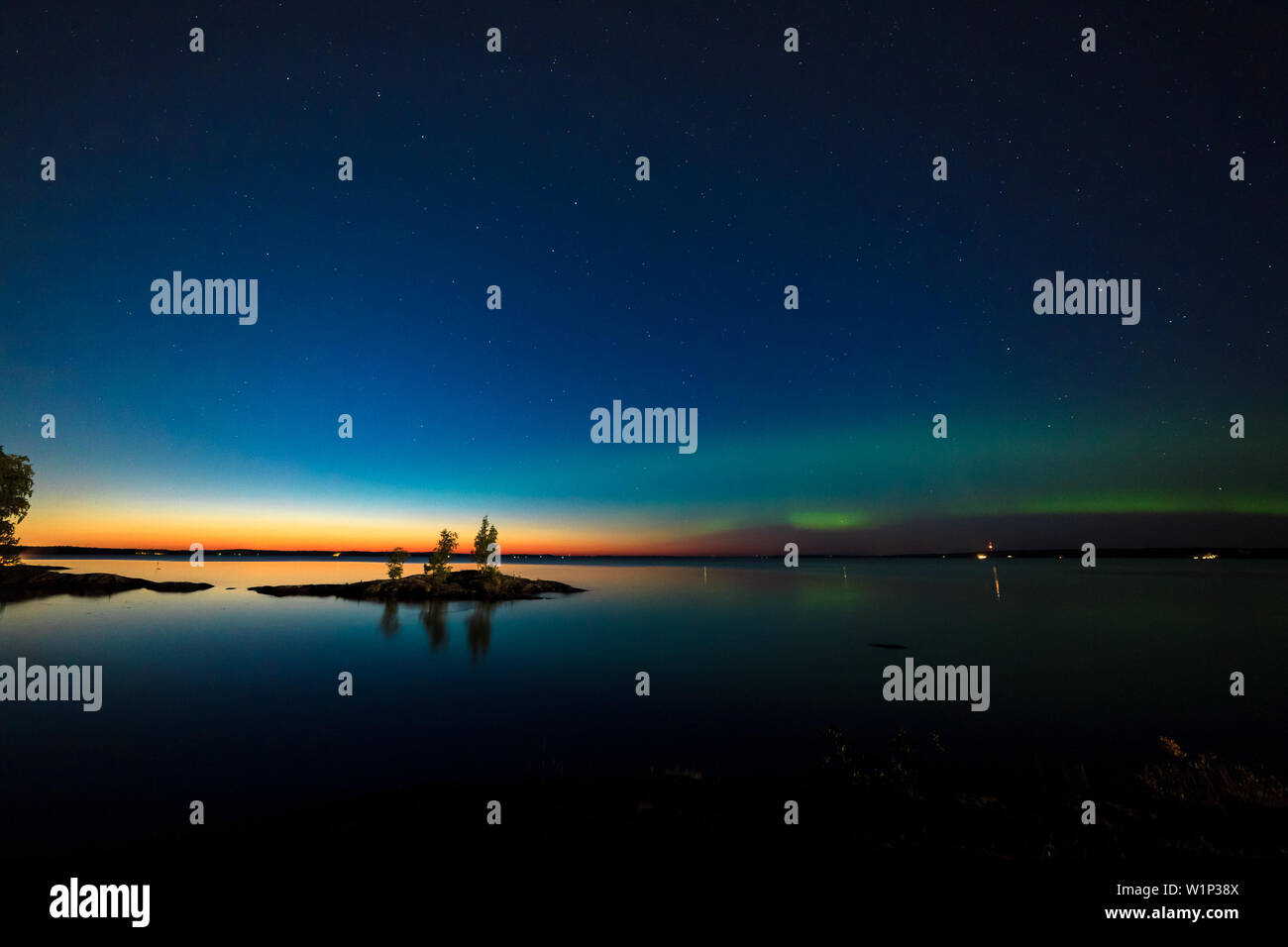 Northern lights aurora borealis at sunset hi-res stock photography and ...