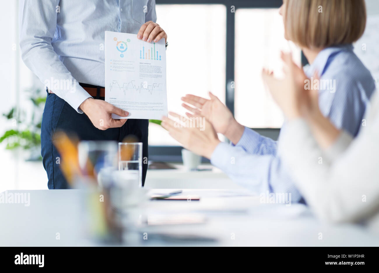 business team at office meeting or presentation Stock Photo - Alamy