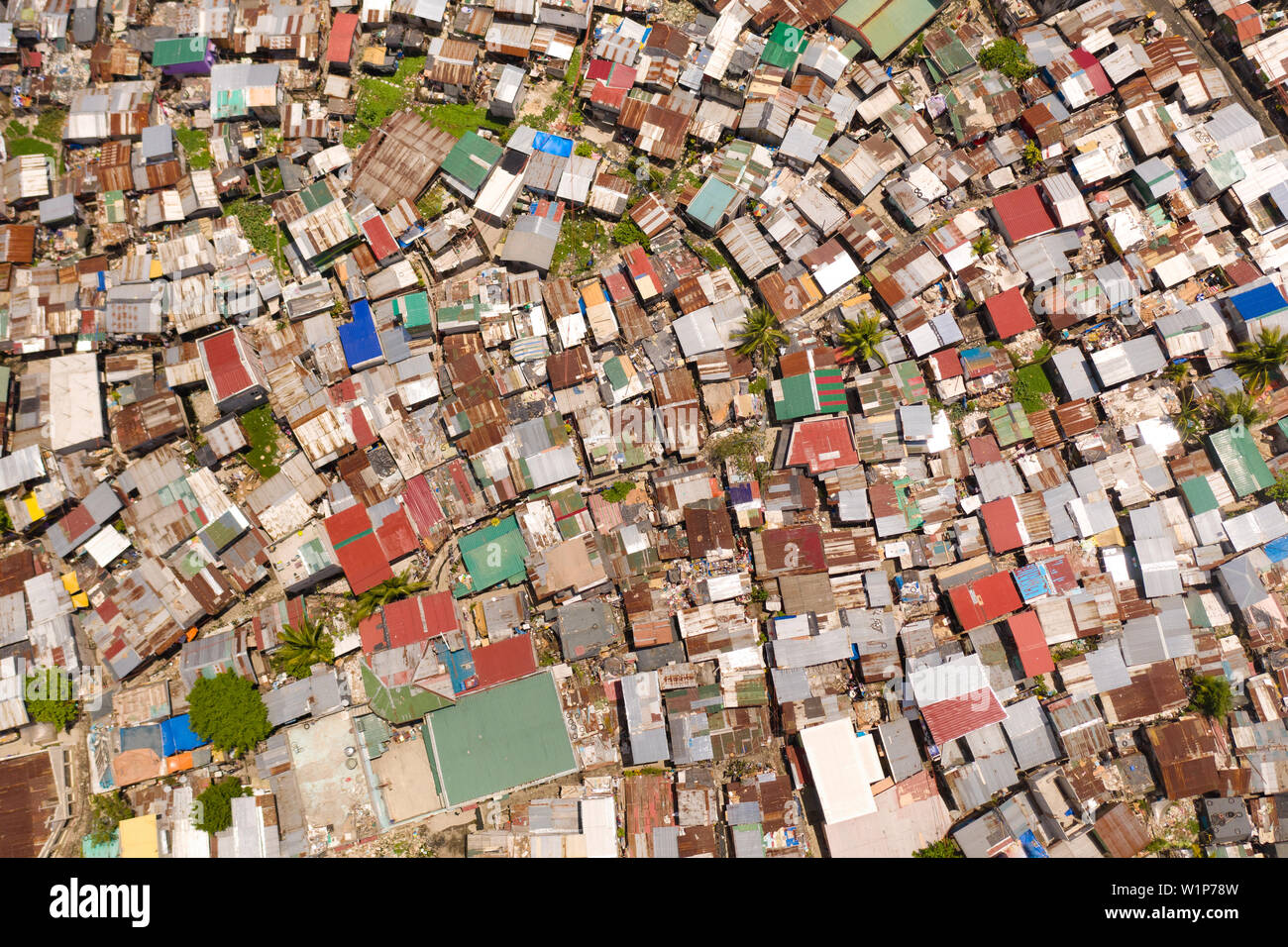 Streets of poor areas in Manila. The roofs of houses and the life of ...