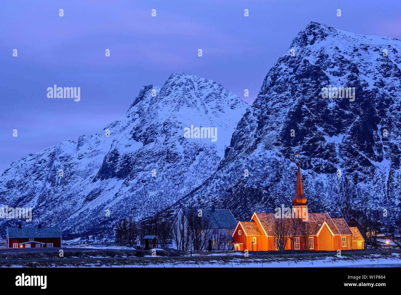 Illuminated church of Flakstad, Flakstad, Lofoten, Nordland, Norway ...