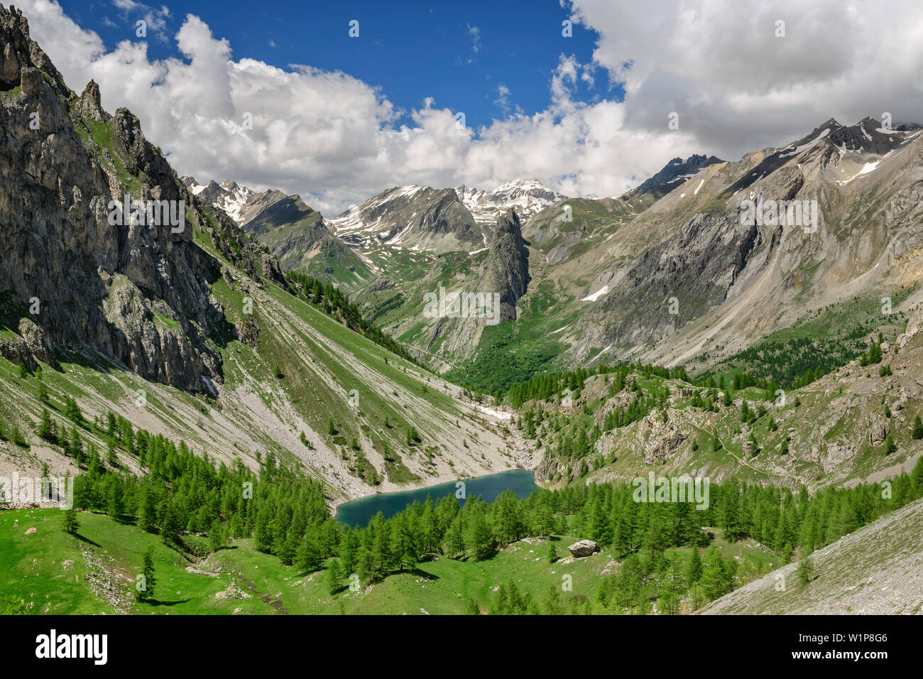 View towards mountain lake and Cottian Alps, Val Maira, Cottian Alps ...