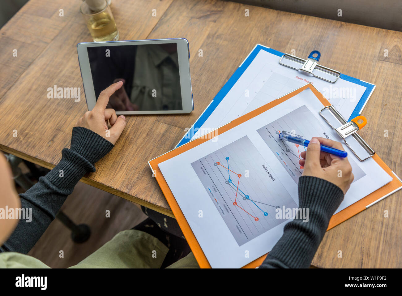Woman tapping tablet screen showing hi-res stock photography and images ...