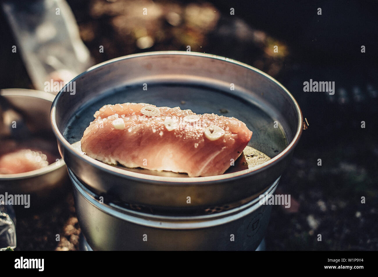 man preparing a fish, greenland, arctic Stock Photo - Alamy