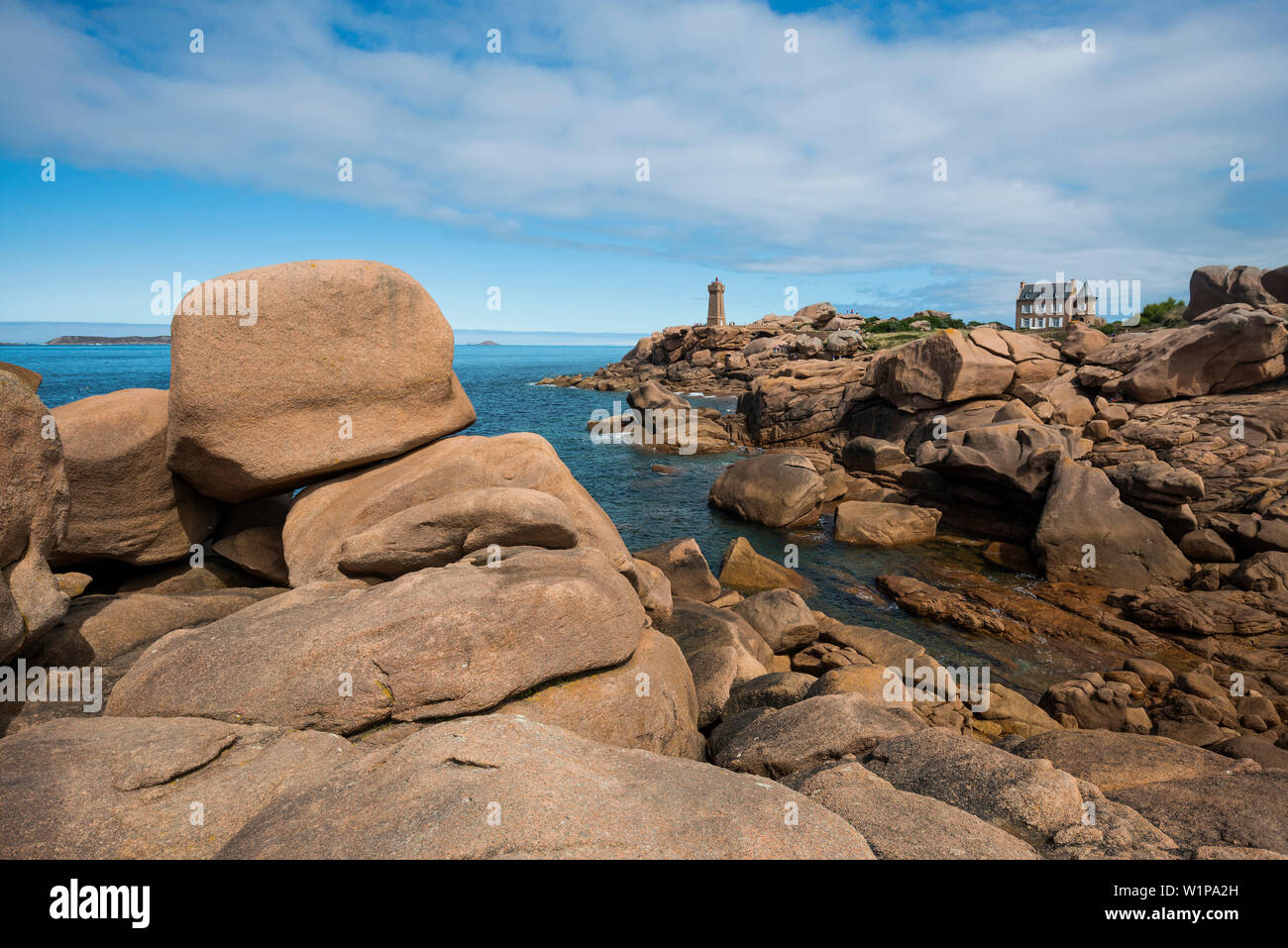 Maison Gustave Eiffel with lighthouse and granite rocks, Phare de ...