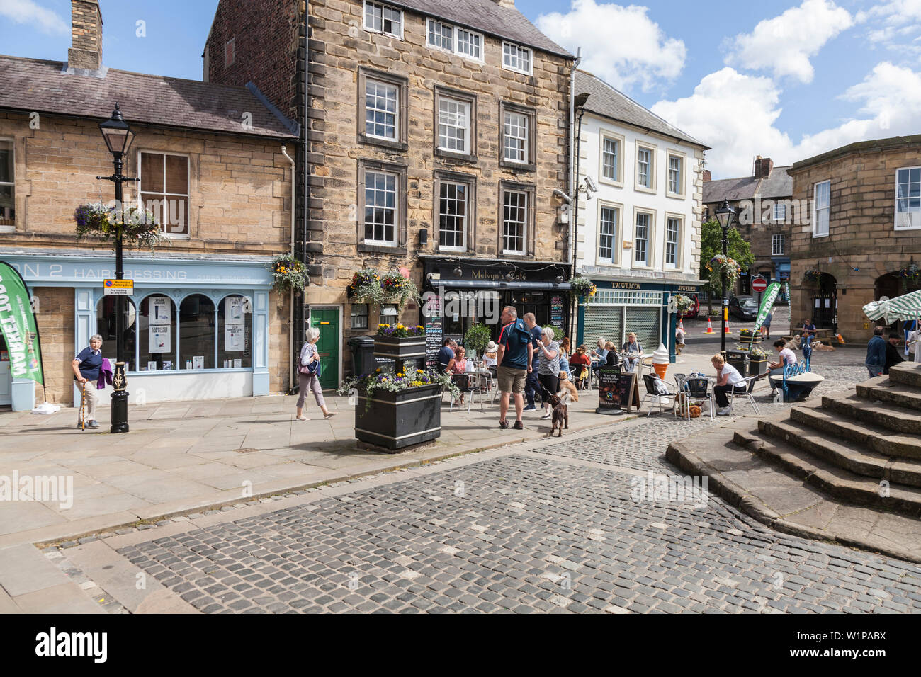 A street scene in the Market Place in Alnwick,Northumberland,England,UK ...