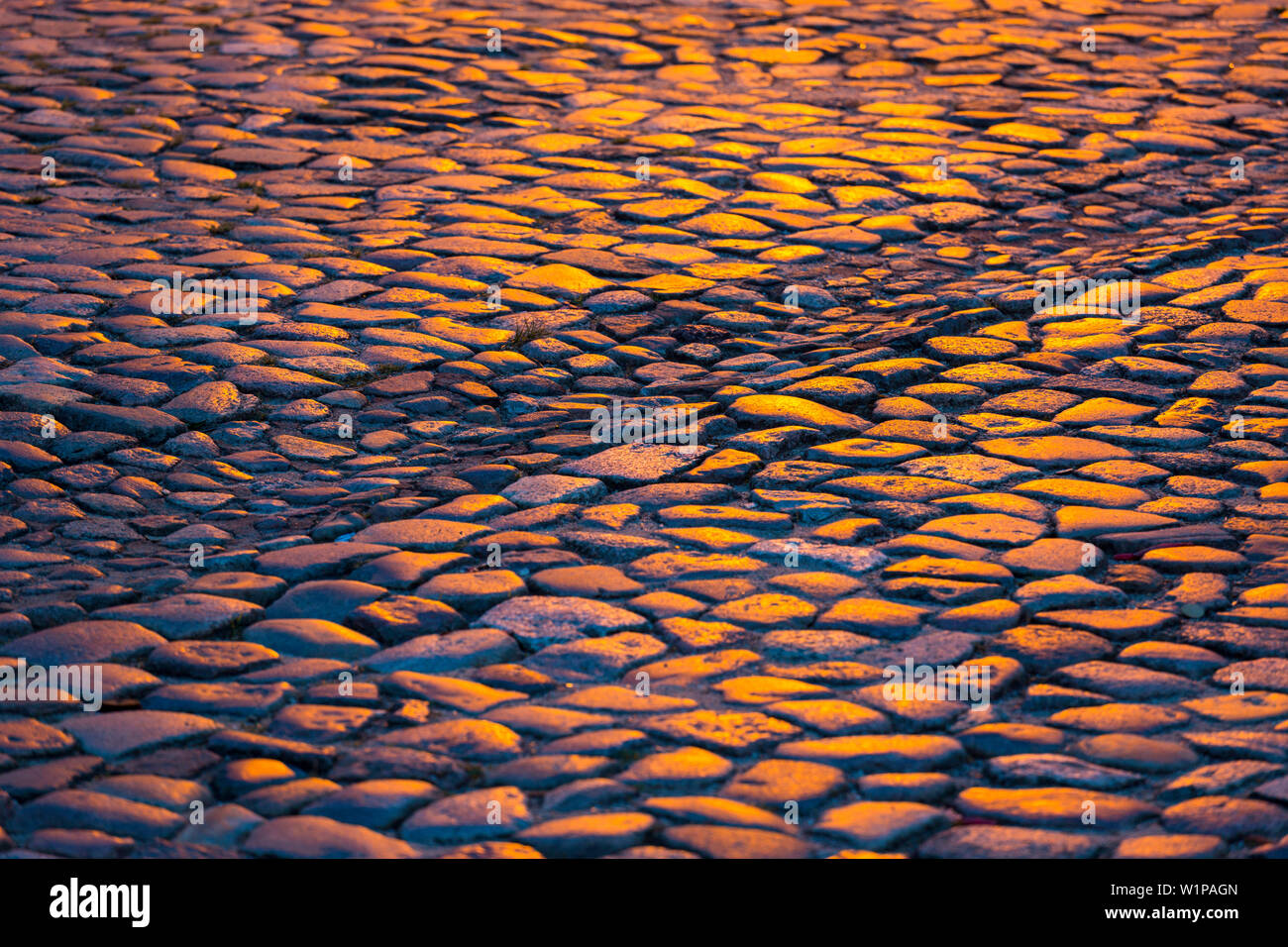 Cobblestones, evening, courtyard of the castle in Wesenberg ...