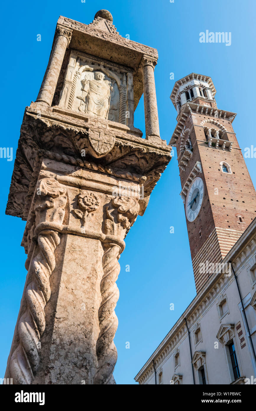 The Colonna Antica column on Piazza delle Erbe in front of the Lamberti ...