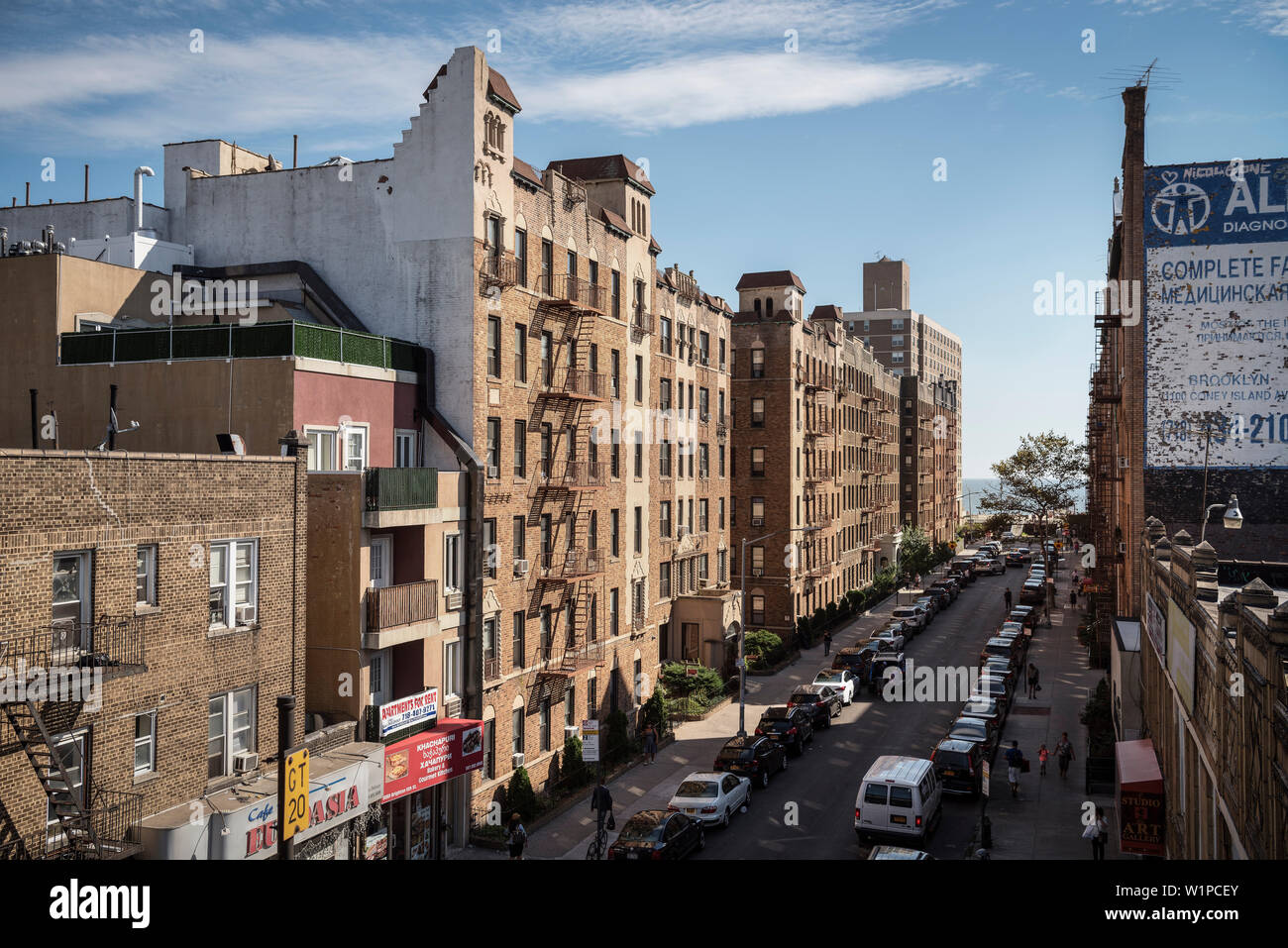 residential buildings on street leading to Coney Island beach, Brooklyn ...