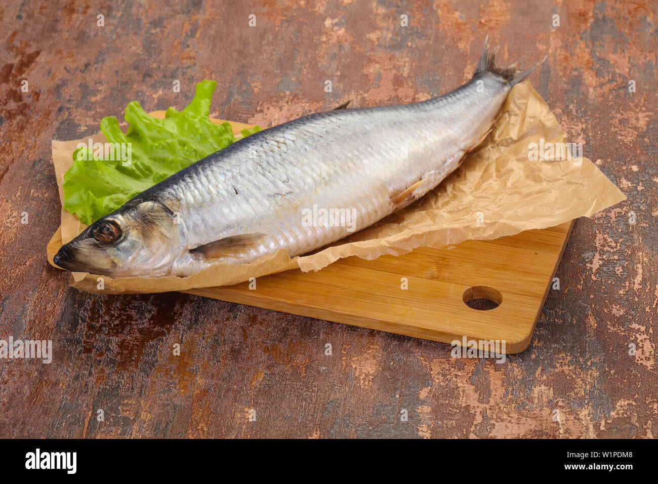 Salted herring fish ready for eat Stock Photo - Alamy
