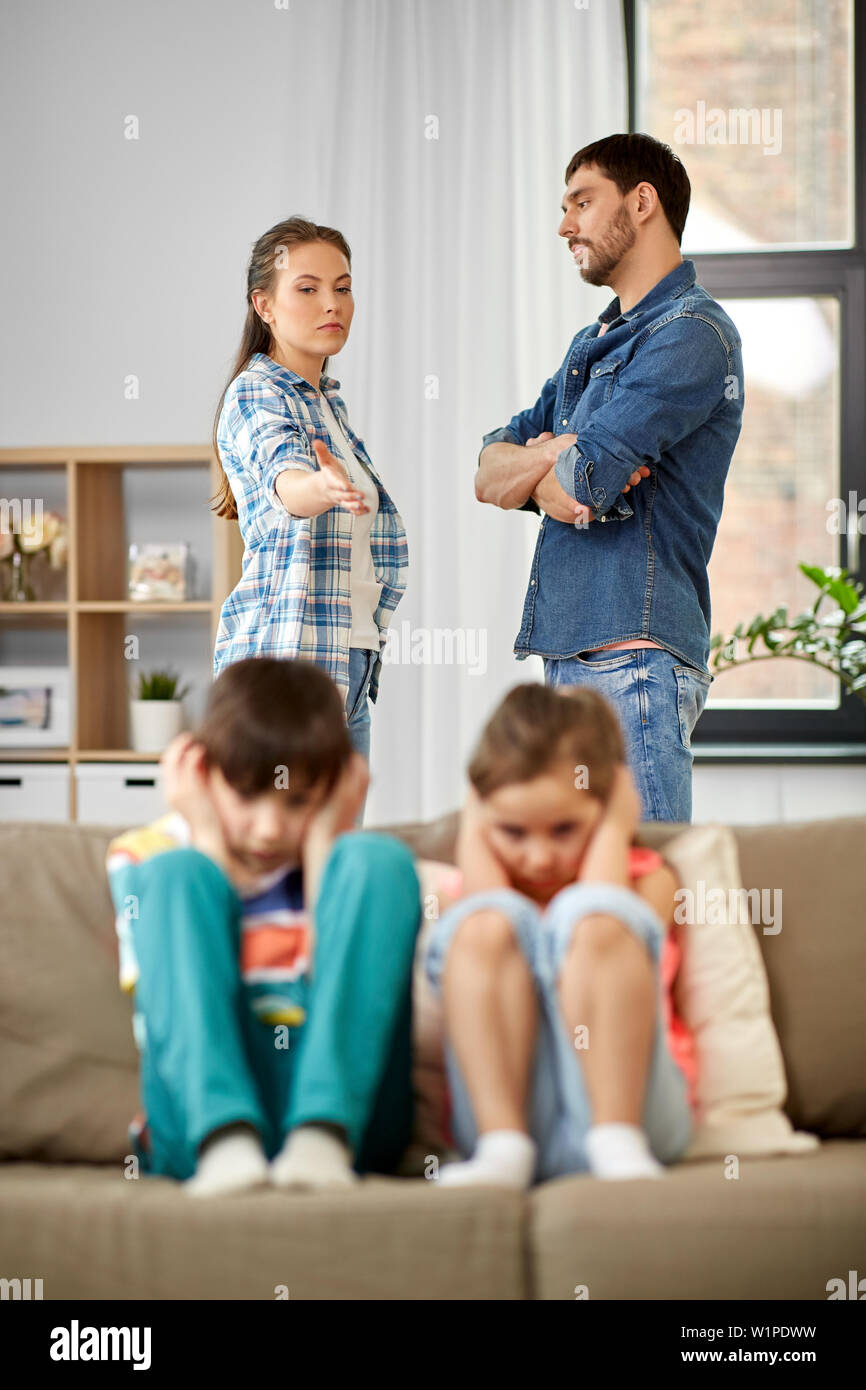 sad children and parents quarreling at home Stock Photo - Alamy