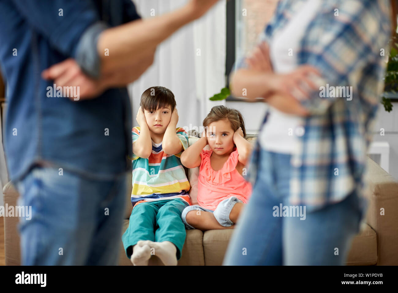 Child watching parents argue hi-res stock photography and images - Alamy