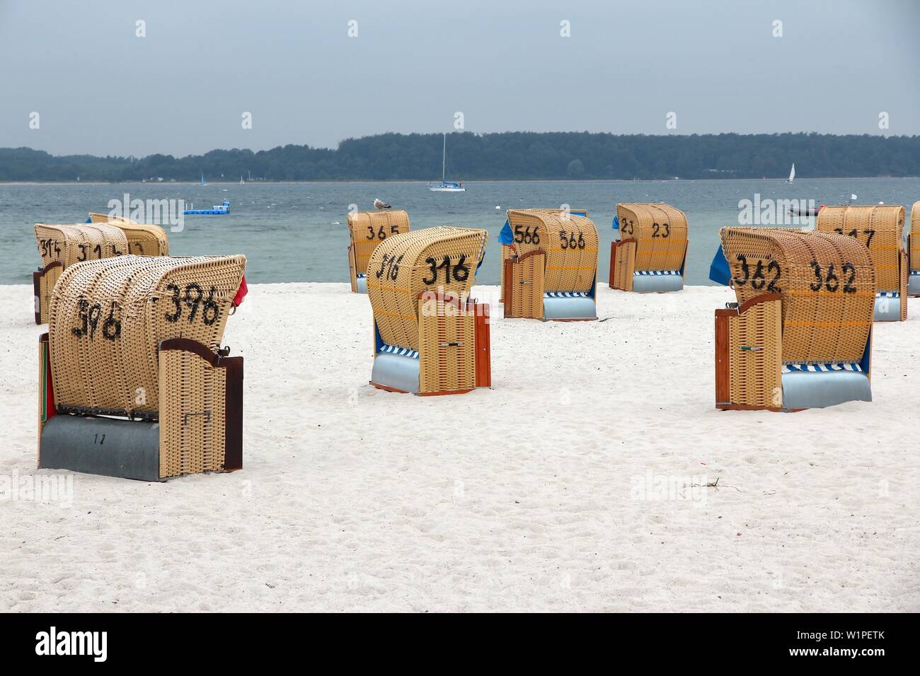 Laboe beach in Schleswig-Holstein region, Germany. Strandkorb is a ...
