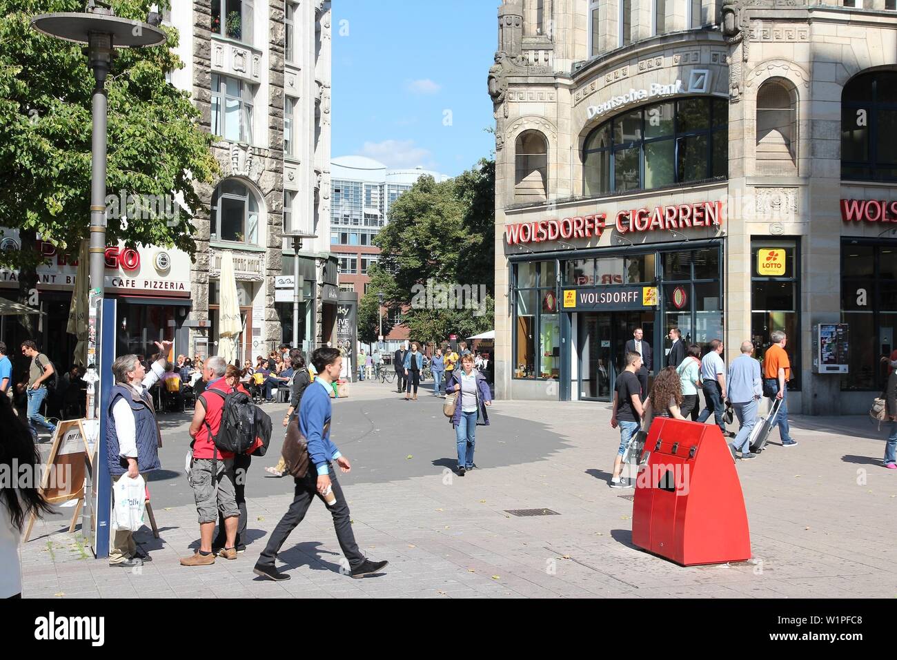 HAMBURG, GERMANY - AUGUST 28, 2014: People visit fashion shops in ...