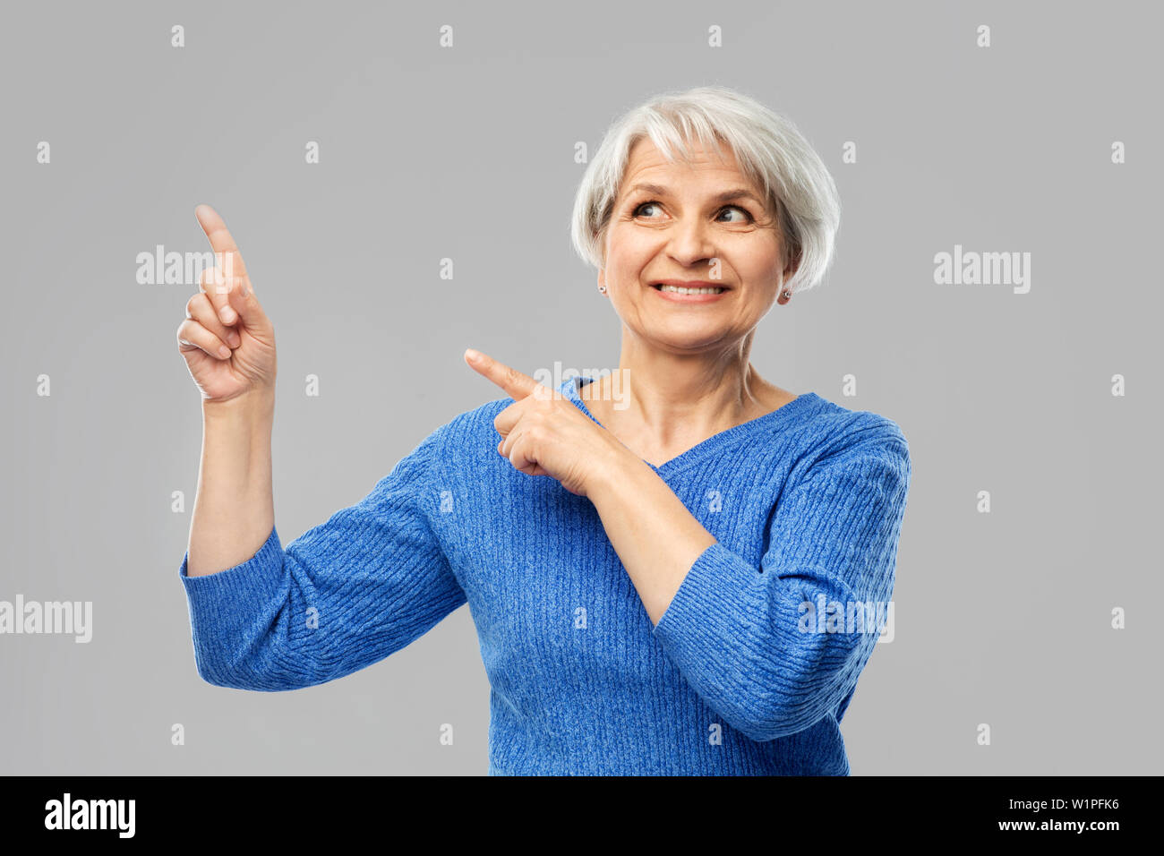 Pointing old woman hi-res stock photography and images - Alamy